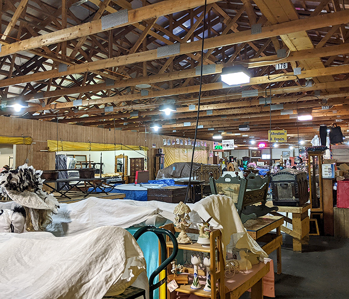 Beneath rustic wooden beams, furniture from every era awaits its second chance at making a house feel like home.