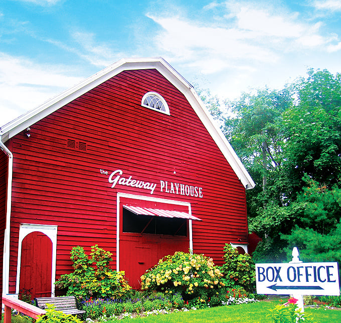 The Gateway Playhouse's iconic red barn exterior isn't just eye-catching – it's a cultural landmark where Broadway-caliber performances happen in small-town America.