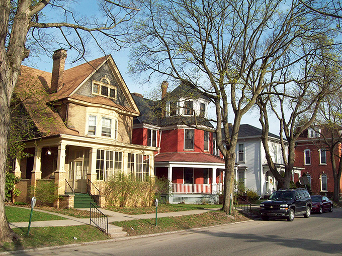 Victorian elegance stands proudly on tree-lined streets where architectural details tell tales of craftsmanship and community pride.