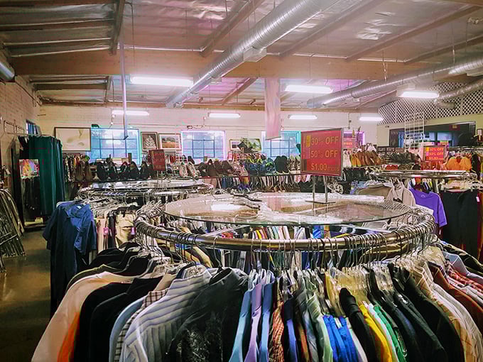 Circular racks create a thrifter's paradise where patience and persistence pay off. The hunt is half the fun!