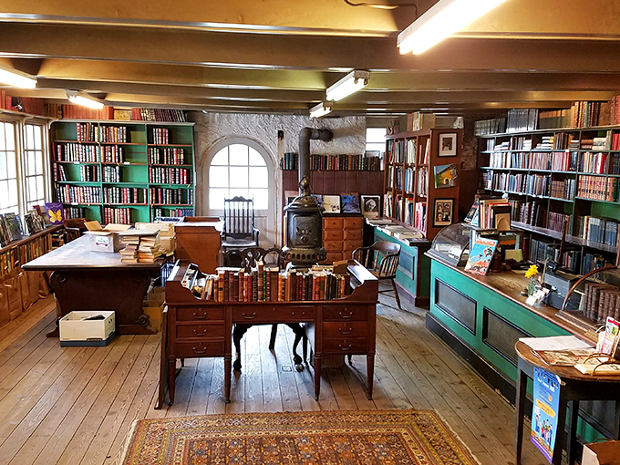 That antique desk isn't just furniture&mdash;it's mission control for literary expeditions, complete with the cast-iron stove that's warmed countless bookworms on chilly Pennsylvania afternoons. 