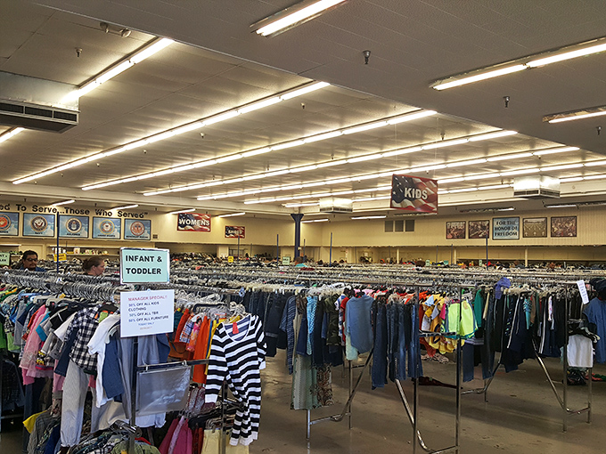 The children's clothing section stretches toward infinity, a color-coded wonderland where tiny fashionistas can build wardrobes without breaking piggy banks.