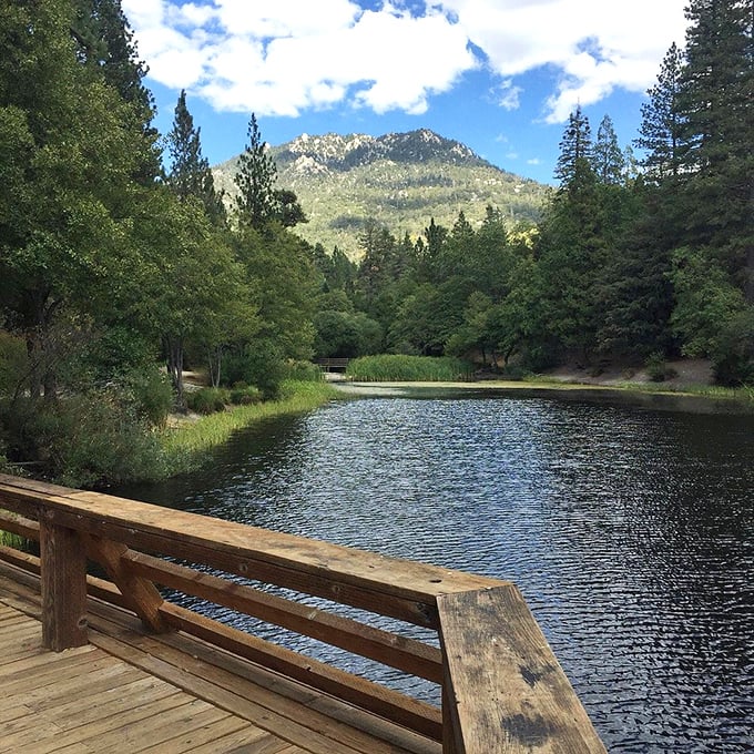 Lake Fulmor's glassy surface reflects the mountains with such perfection, it's like Mother Nature showing off her Photoshop skills.