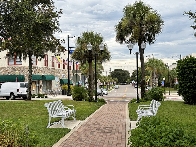 Palm trees standing guard over brick-paved walkways&mdash;nature's way of saying "slow down and enjoy retirement" without sending you a bill.
