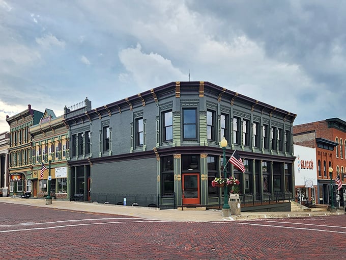 The Kraft Building stands sentinel at the corner, its elegant architecture a reminder of when commercial buildings were designed to impress, not just exist.