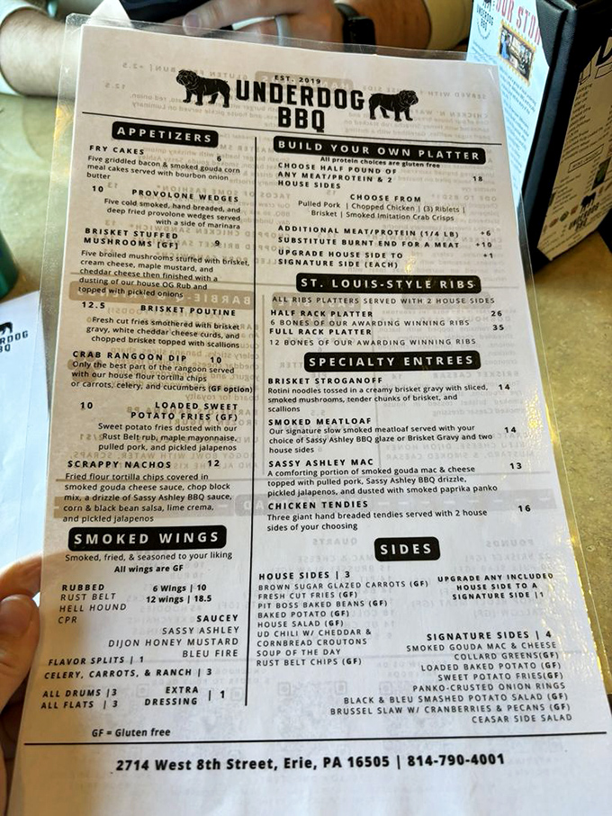 The menu reads like a love letter to smoked meats, with specialties like Brisket Stuffed Mushrooms and Sassy Ashley Mac tempting even the most disciplined diners.