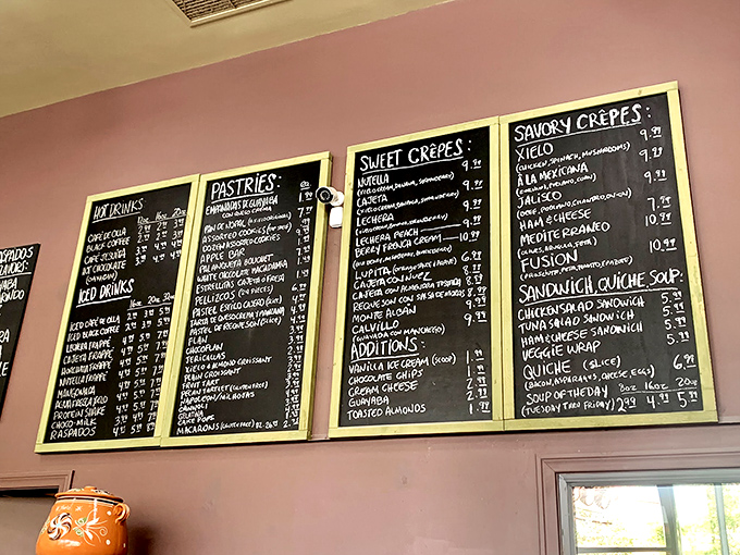 The menu board reads like a dessert lover's bucket list&mdash;sweet crepes, savory crepes, and pastries that'll make you question your commitment to moderation.