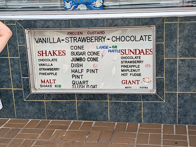 This isn't a menu&mdash;it's a declaration of frozen custard principles. Vanilla, chocolate, strawberry: the holy trinity that needs no improvement.