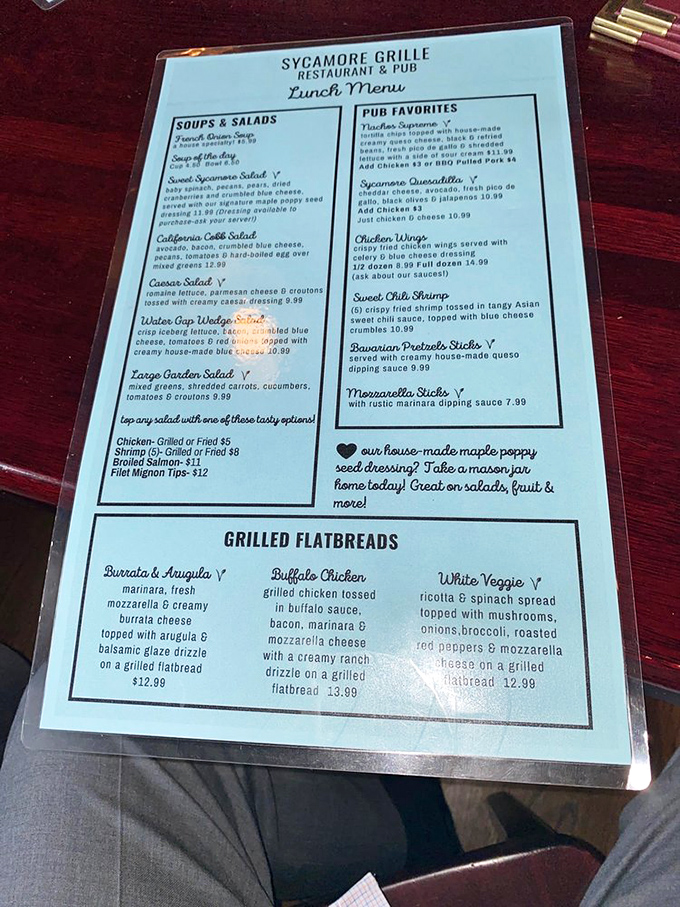 The menu reads like a love letter to comfort food classics, with the French onion soup standing tall as the uncontested star.