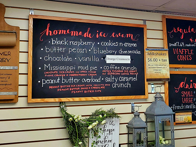 That chalkboard menu isn't just listing ice cream flavors&mdash;it's offering a roadmap to happiness. Mississippi Mud Pie or Peanut Butter Overload? Life's toughest decisions.