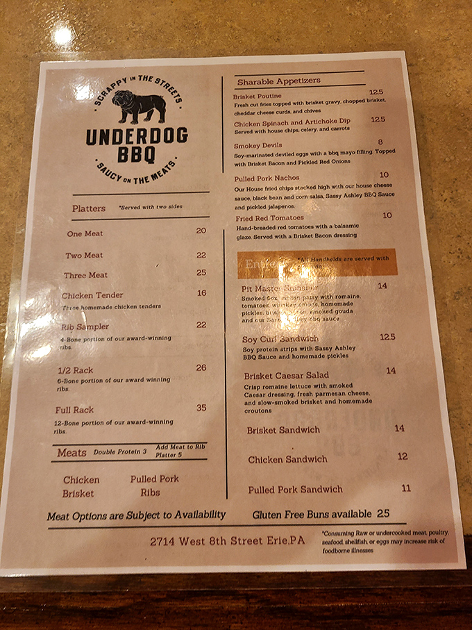 A menu that gets straight to the point: meat, sides, and happiness. The "Scrappy in the Streets, Saucy on the Meats" tagline tells you everything you need to know.