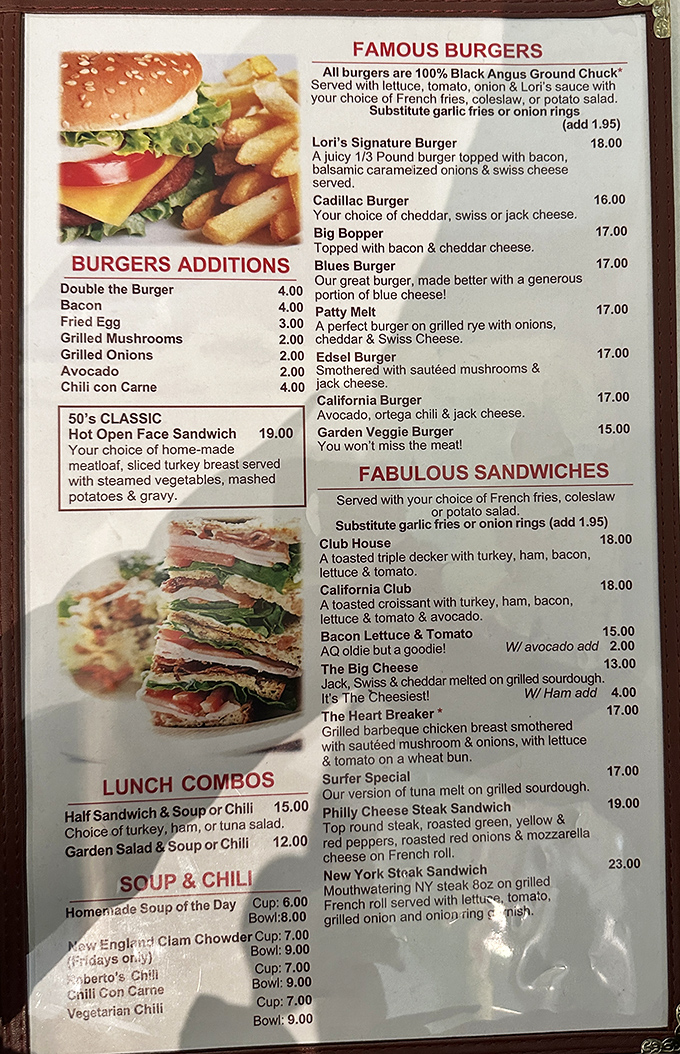 The menu reads like a love letter to American comfort food classics, with burgers and milkshakes taking center stage in this culinary time capsule.