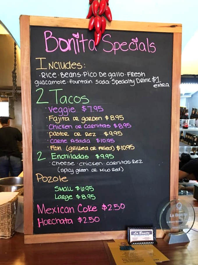 A menu board that speaks the universal language of "get in my belly." The colorful chalk promises treasures that'll have you plotting your next visit before finishing your first.