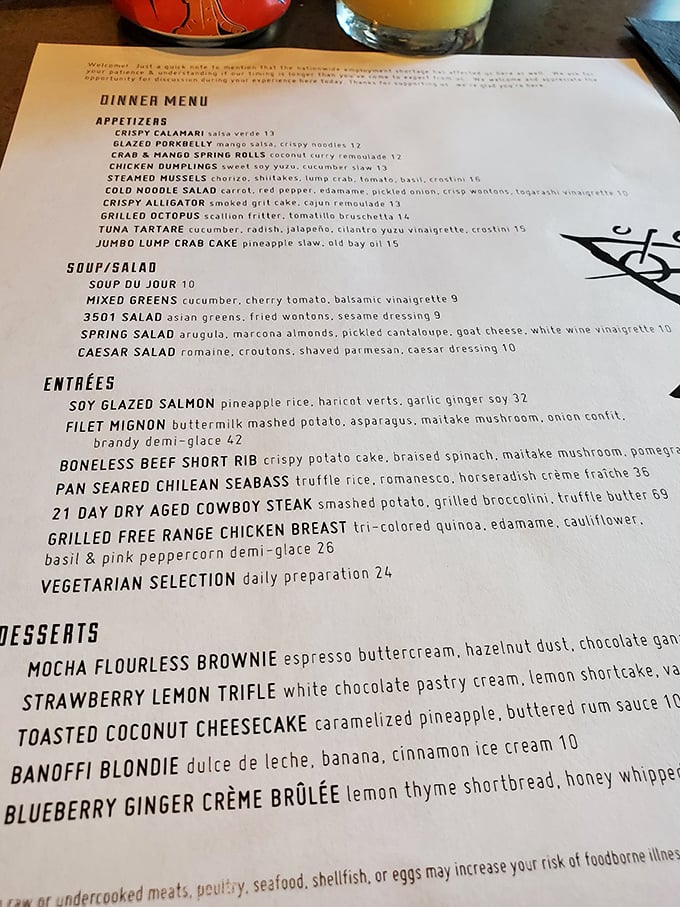 A menu that reads like a love letter to global cuisine. Each description is a promise of flavors to come, with those short ribs practically winking at you.