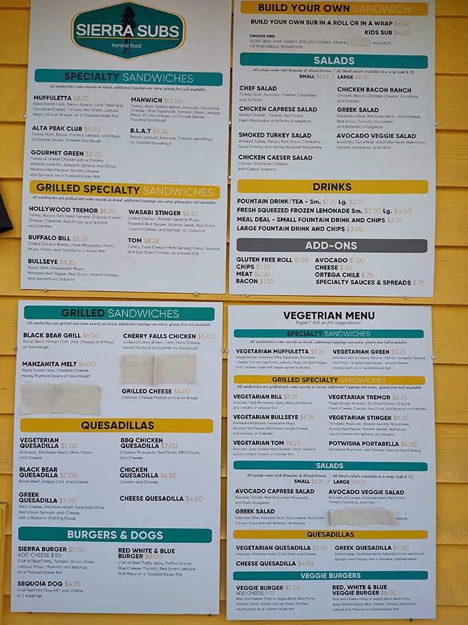 A menu board that reads like a love letter to sandwich creativity. Each name—from Muffuletta to Wasabi Stinger—promises its own culinary adventure.