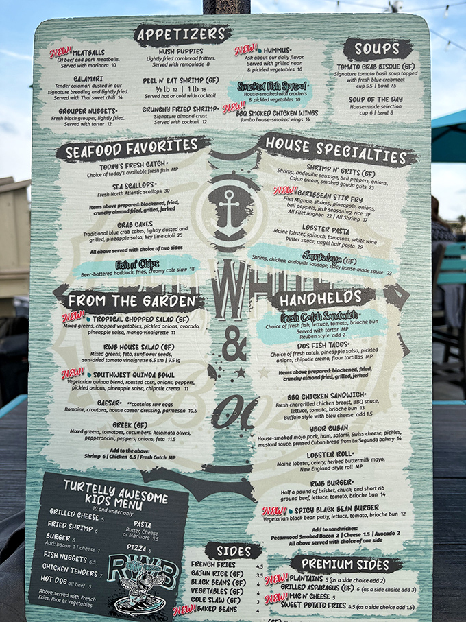 A menu that reads like a love letter to seafood enthusiasts. Notice that anchor logo? It's not just decoration&mdash;it's a promise to anchor your hunger.
