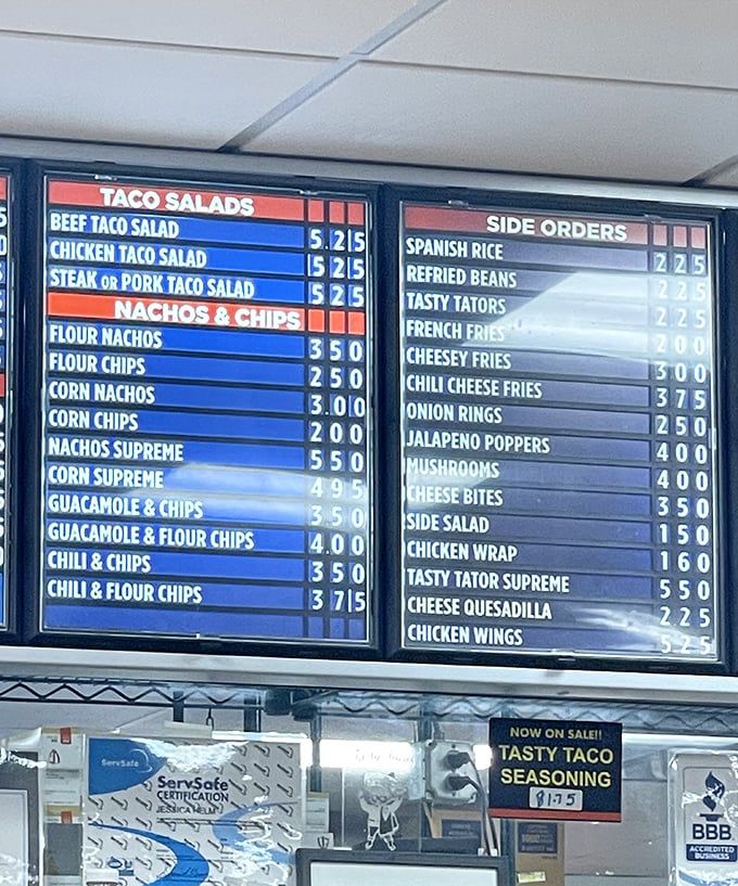 This menu board is like a roadmap to happiness. Choose your own adventure, but the nachos are calling your name.