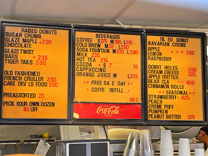 The menu board tells a story of donut possibilities, with the seasonal strawberry commanding top dollar&mdash;and worth every penny.