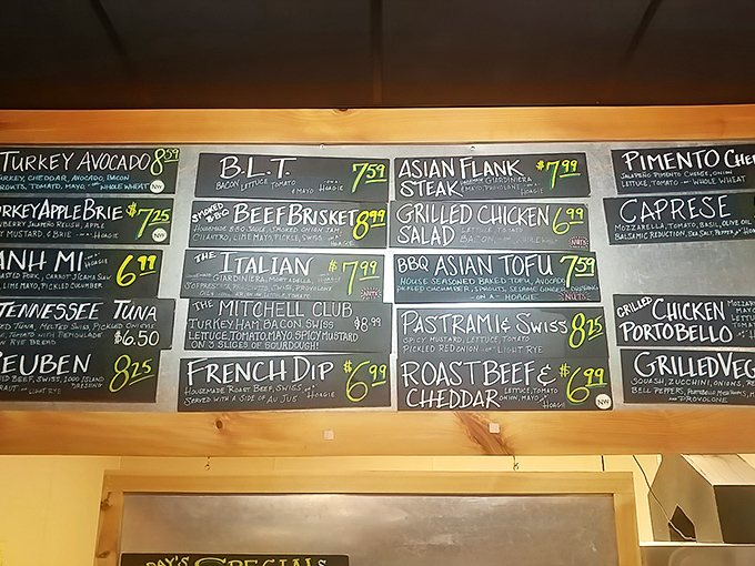 The chalkboard menu reads like poetry to sandwich lovers. Each option promises its own unique flavor journey&mdash;choose your adventure!