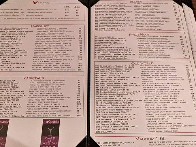 A wine list that requires reading glasses and decision-making skills. Choose wisely, friends&mdash;memorable meals deserve worthy companions.