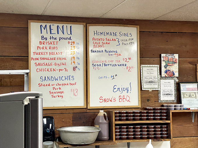 This handwritten menu isn't just a list of options &ndash; it's a sacred text, promising smoky salvation by the pound.