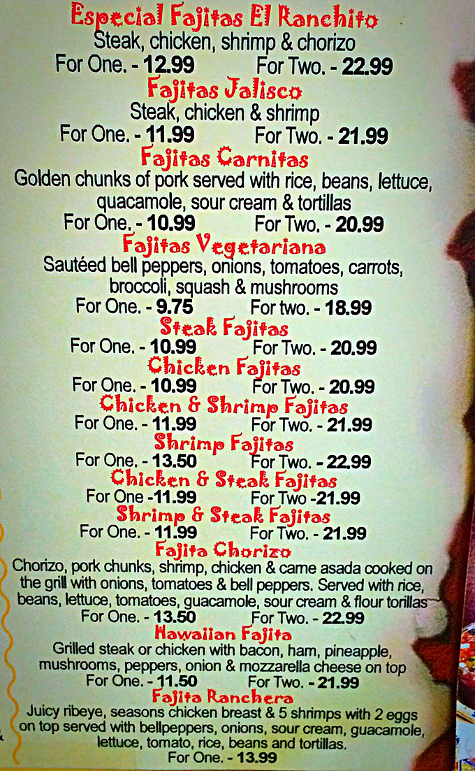The fajitas menu reads like a choose-your-own-adventure novel where every ending involves sizzling satisfaction and the inevitable question: "Should I have ordered two?"