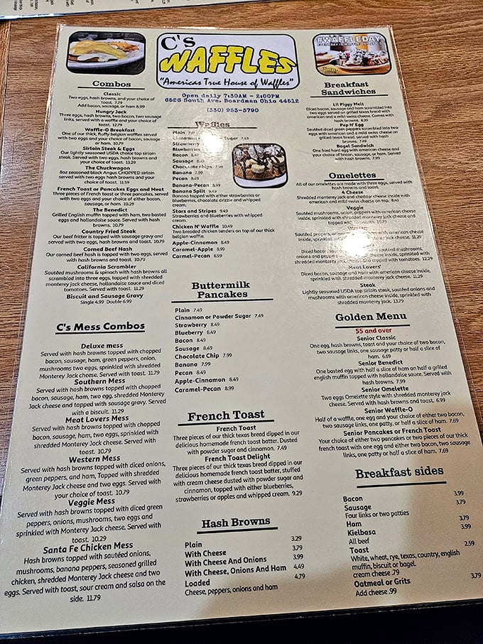 That vibrant yellow menu isn't just cheerful; it's a road map to breakfast nirvana with more waffle variations than there are days in the week.