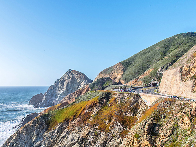 Highway? More like a sky-way. This stretch of coastal road makes your regular commute look like a sad screensaver by comparison.