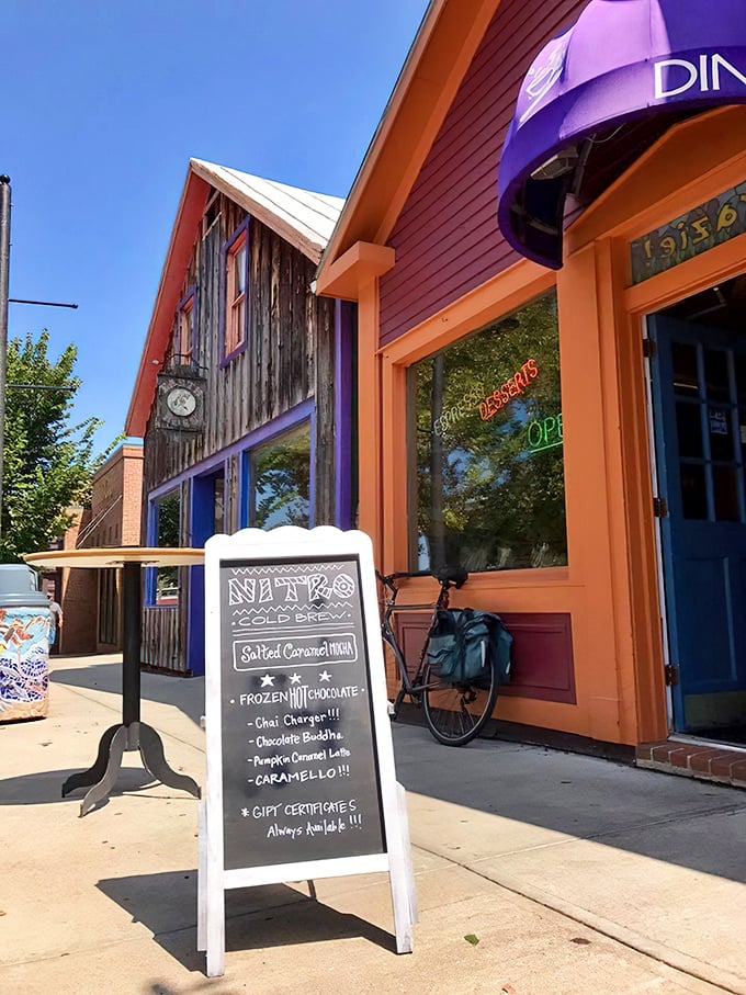 Neon-bright storefronts and rustic wood siding create Yellow Springs' signature aesthetic&mdash;where hippie meets hipster in a delightful visual cocktail.
