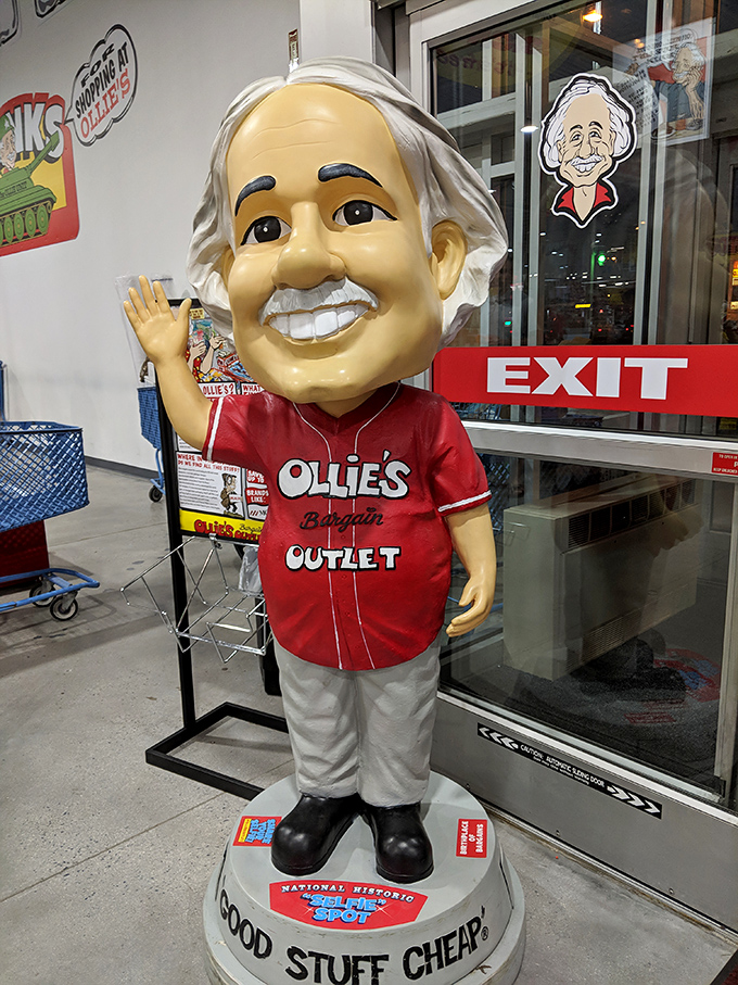 Meet the unofficial mayor of markdown city! Ollie's mascot greets shoppers with that "I know something you don't" grin of bargain anticipation.