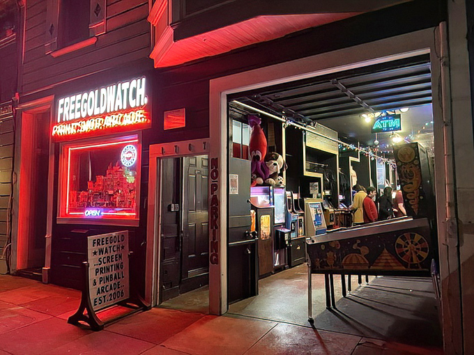 The glowing red sign beckons like a lighthouse for the nostalgic soul. Even the bicycle parked outside seems to be waiting its turn.