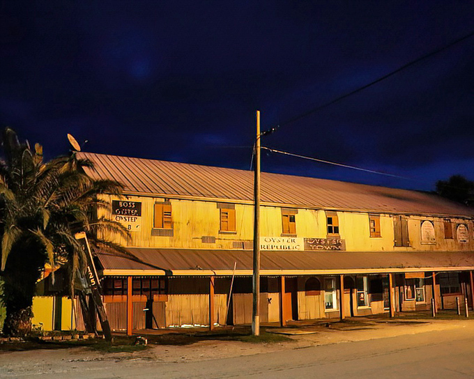 The Oyster Republic glows like a beacon at dusk, promising briny treasures that have made this coastal town famous for generations.
