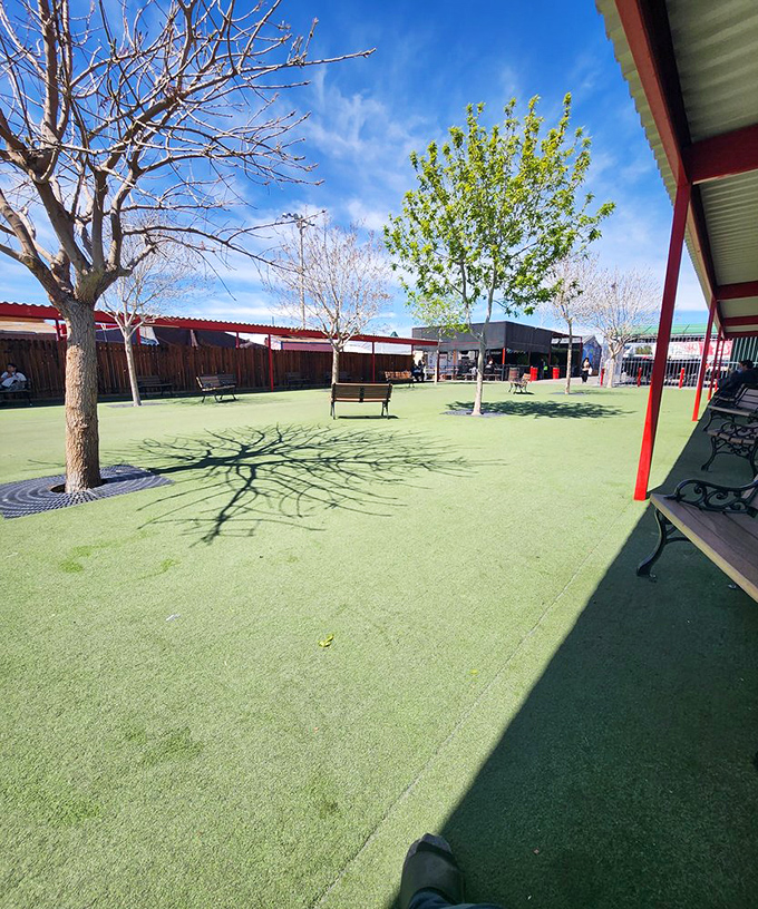 A peaceful oasis amid the marketplace madness. When your shopping bags outweigh your stamina, these benches become five-star accommodations.
