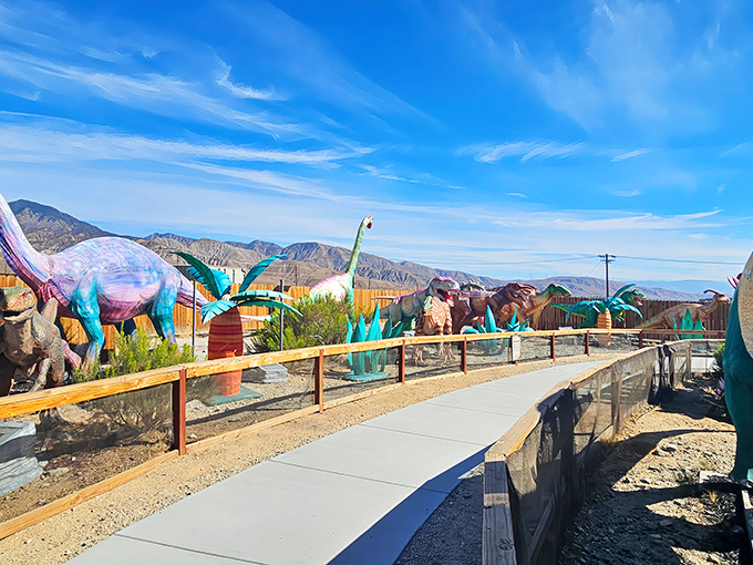 Follow the prehistoric path where colorful dinosaurs line the way like the world's most ancient welcoming committee.