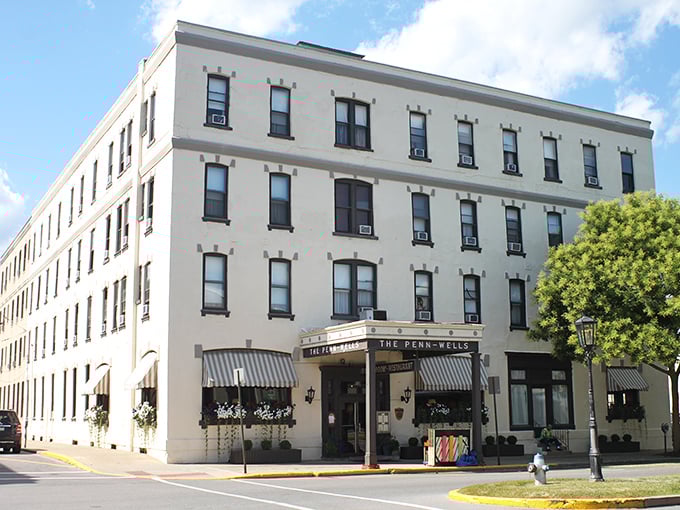 The stately Penn Wells Hotel stands as Wellsboro's grand dame, offering historic charm without making you use historically authentic plumbing.