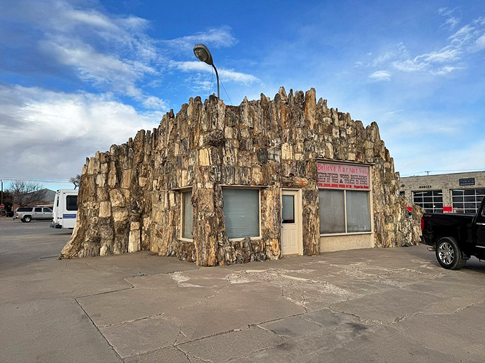 The petrified wood gas station stands as Lamar's quirky architectural gem. Fred Flintstone would call this his dream mid-century modern home.