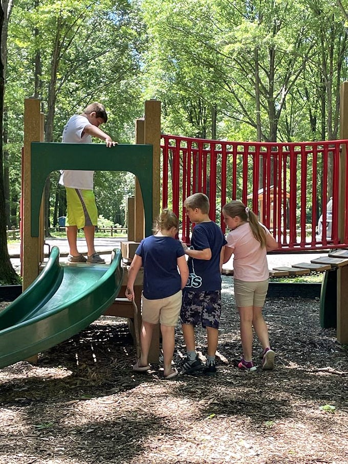 Kids navigating playground politics &ndash; that timeless childhood diplomacy of "who goes next" that somehow prepares us for adult life.