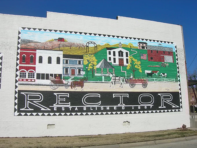 The town's history unfolds in vibrant color on this mural, where horse-drawn carriages remind us of simpler times before Amazon Prime.
