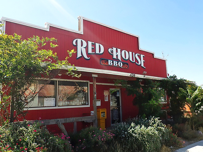 Red House BBQ's vibrant exterior promises what every good BBQ joint should: food worth the inevitable shirt stain.