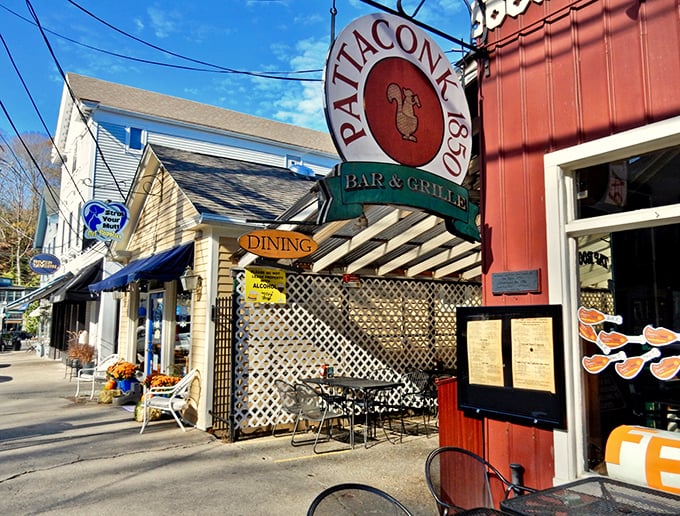 The Pattaconk 1850 Bar & Grille's outdoor seating beckons like an old friend. This is where conversations between strangers flow as freely as the local beer.