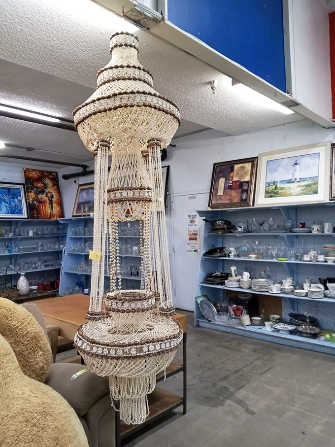 This ornate macrame chandelier hangs like a 1970s dream that someone's grandmother lovingly crafted during disco's golden age.