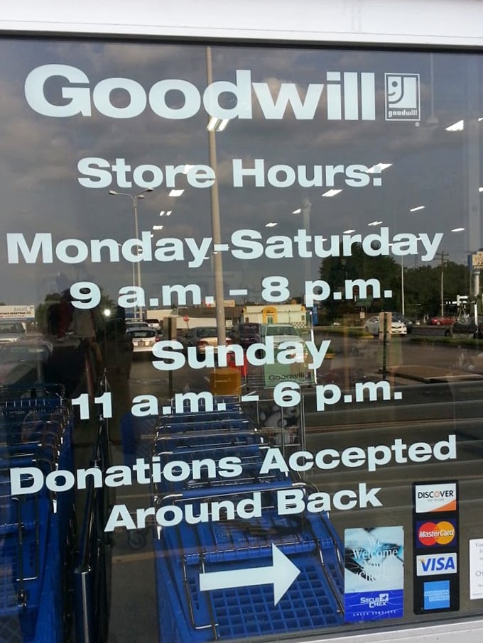 The store hours sign: your invitation to the bargain Olympics. Note the "Donations Accepted" line—the circle of thrift life continues.