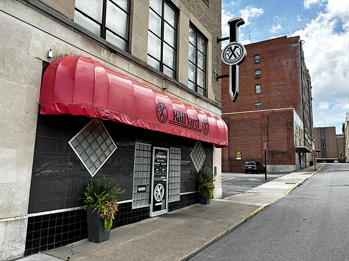 The Railyard Restaurant's distinctive red awning signals comfort food at prices that won't derail your budget.