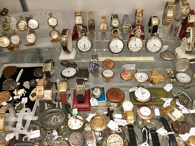 Time literally stands still in this display case. Each watch face has counted heartbeats through someone else's history before waiting for yours.