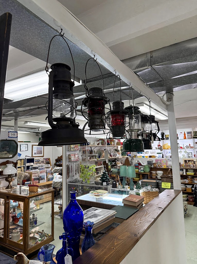 These vintage lanterns once illuminated farmhouses and railroad crossings. Now they hang in suspended animation, waiting to cast their warm glow in someone's modern home.