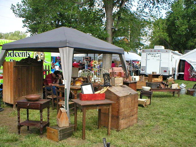 Rustic wooden furniture under canvas canopies&mdash;where farmhouse chic was a thing long before HGTV convinced suburban America it needed more shiplap.