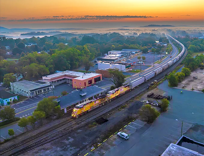 Morning mist blankets Crozet like nature's own cotton candy, while trains rumble through town&mdash;a daily reminder of the railroad heritage that birthed this mountain gem.