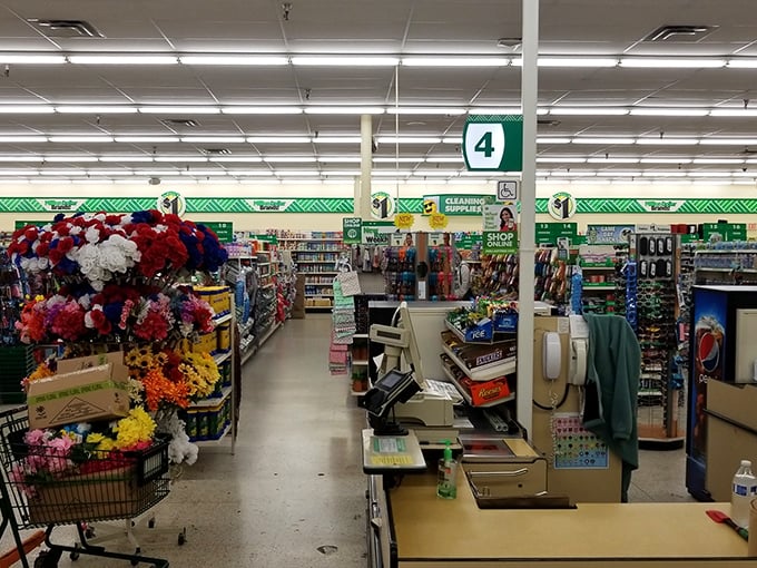 Aisle 4 stands ready for checkout adventures. The modern-day treasure hunt ends here, where your bounty of bargains gets tallied.