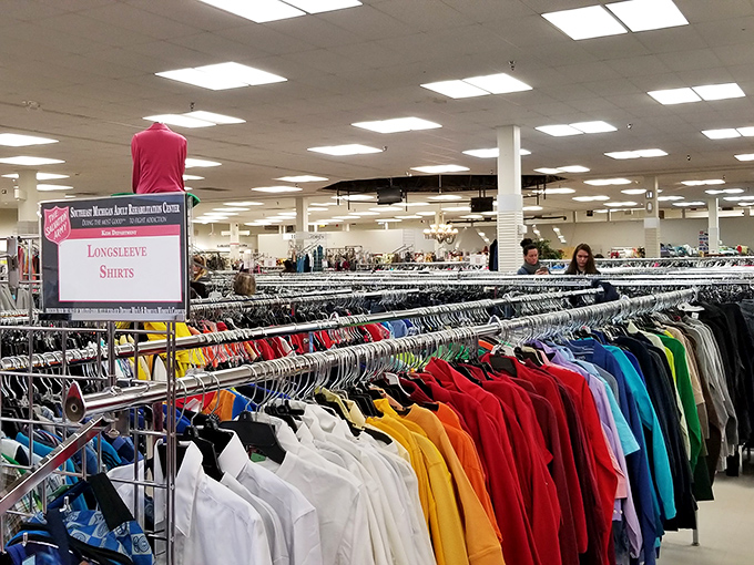 The rainbow of shirts would make Joseph and his technicolor dreamcoat jealous. Every hue imaginable, organized with military precision.