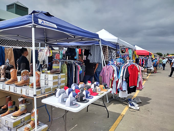 A rainbow of clothing options stretches as far as the eye can see, with vendors ready to help you find that perfect fit.
